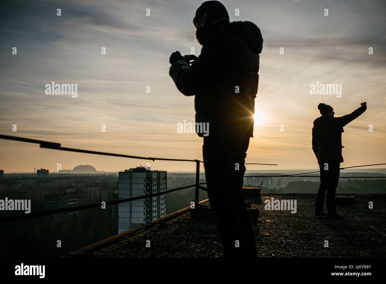 December 7, 2019, Pripyat, Ukraine: Tourists are photographed from the ...