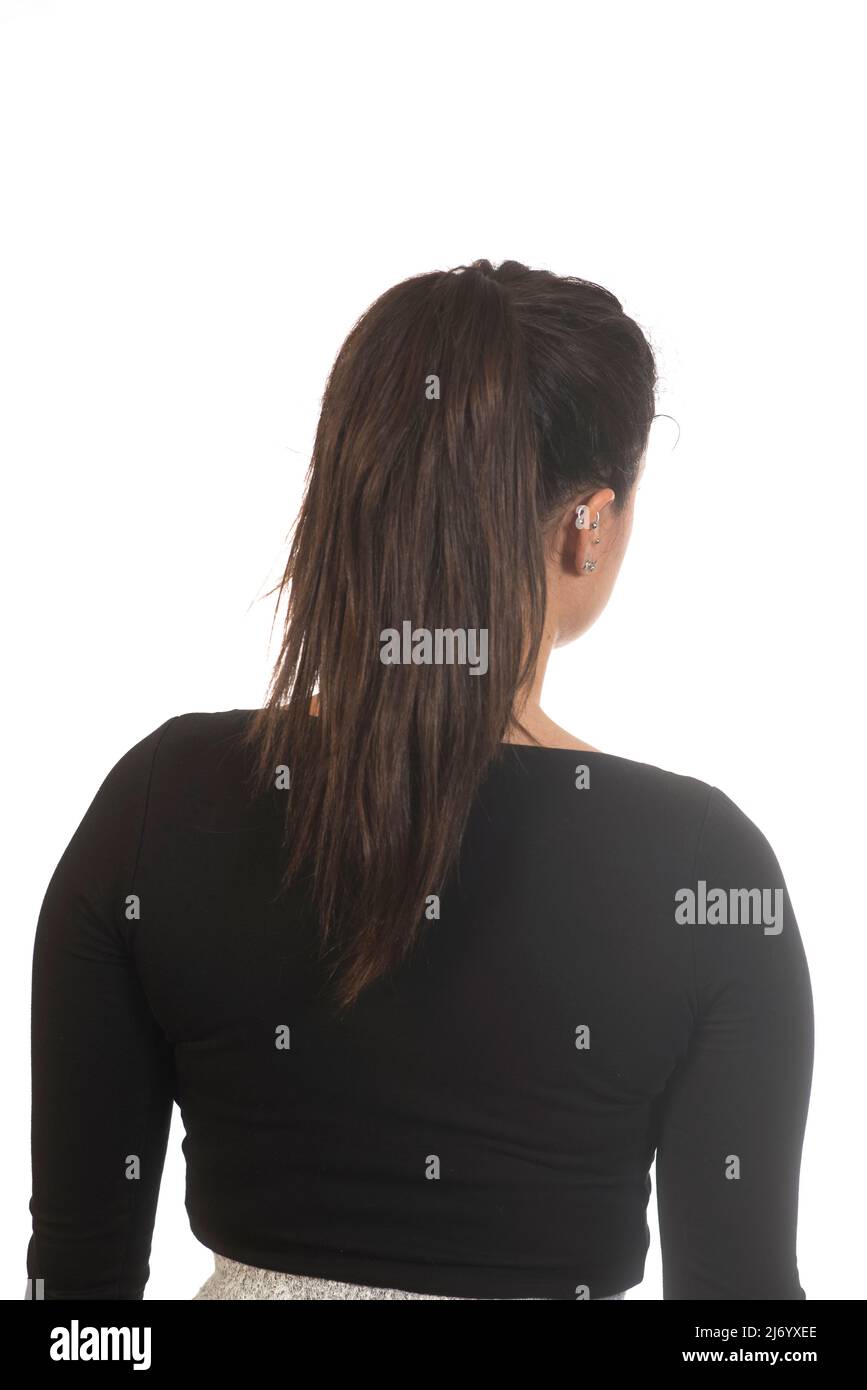 Rear view of a woman with pony tail aginst white background Stock Photo ...