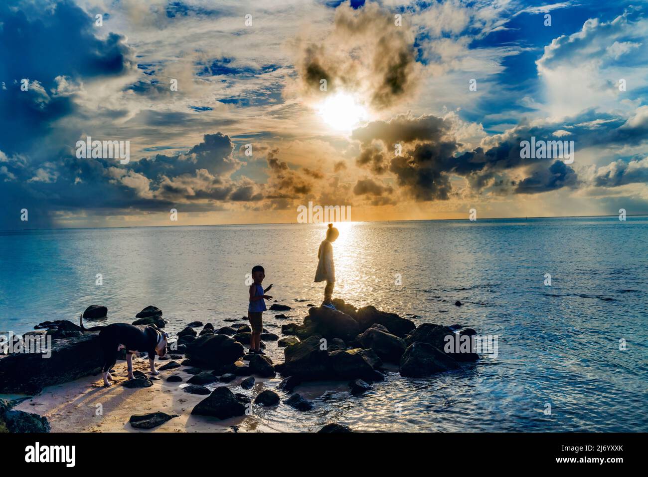Young Girl Boy Sunset Reflection Cloudscape Water Moorea Tahiti French ...