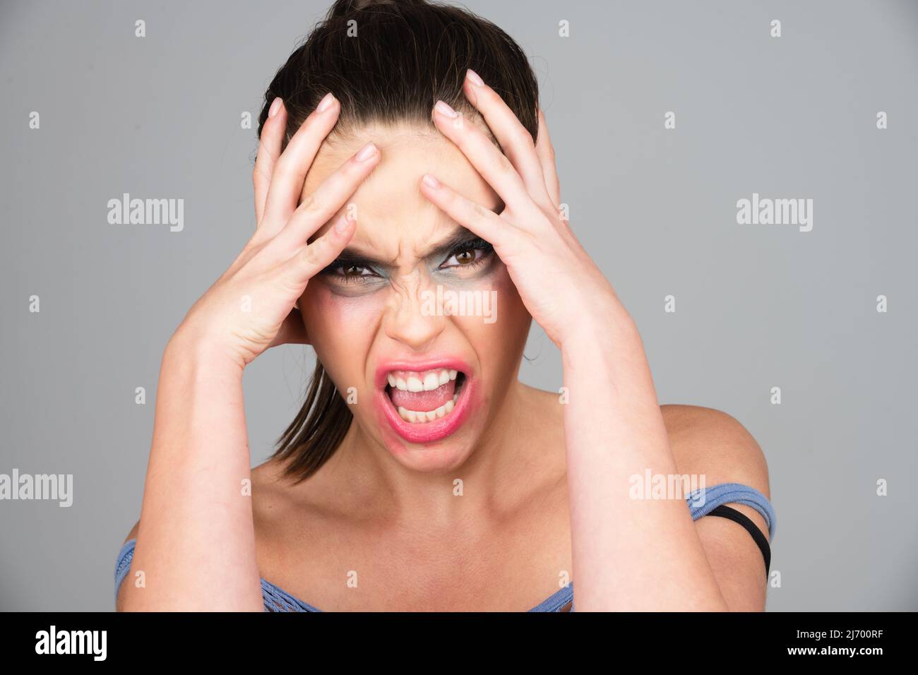 Sad and angry face. Emotional angry woman, upset girl. Screaming, hate, rage. Pensive woman ...