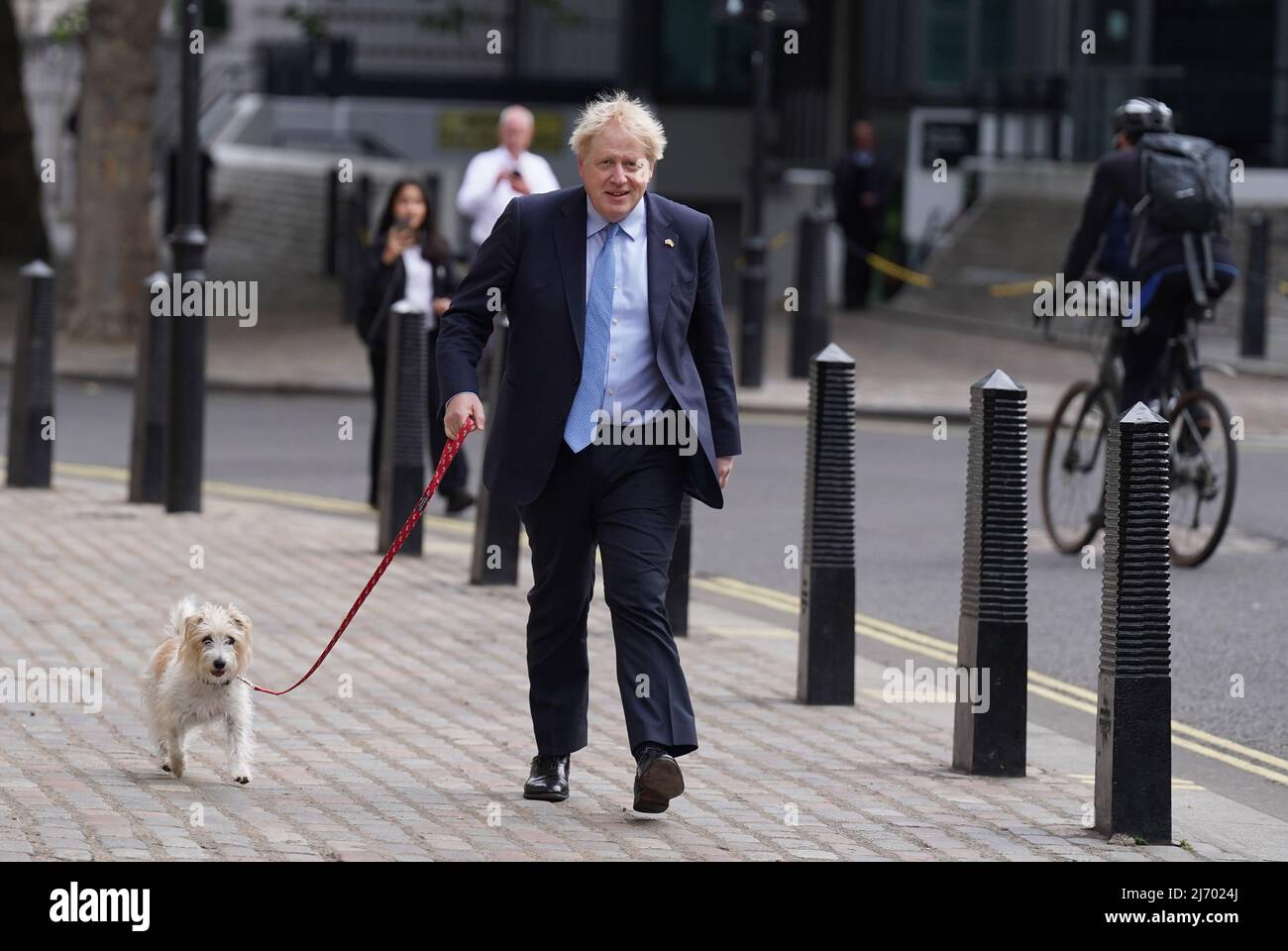 Prime Minister Boris Johnson arrives with his dog Dilyn to vote at ...