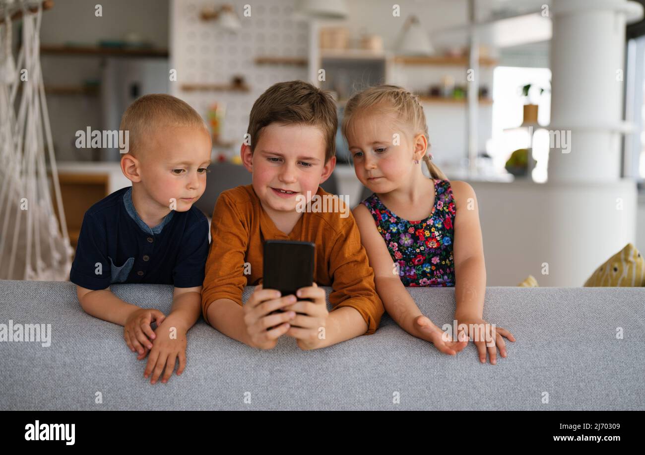 Childhood technology kids smartphone concept. Happy little children ...