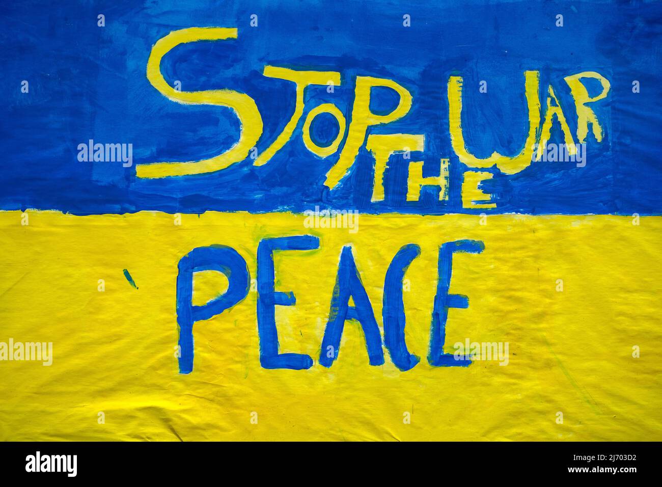 Stop the war peace painting on building wall ukraine flag blue and ...