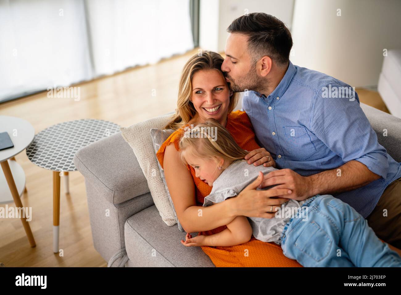 Happy family having fun time at home. Parents children love happiness ...