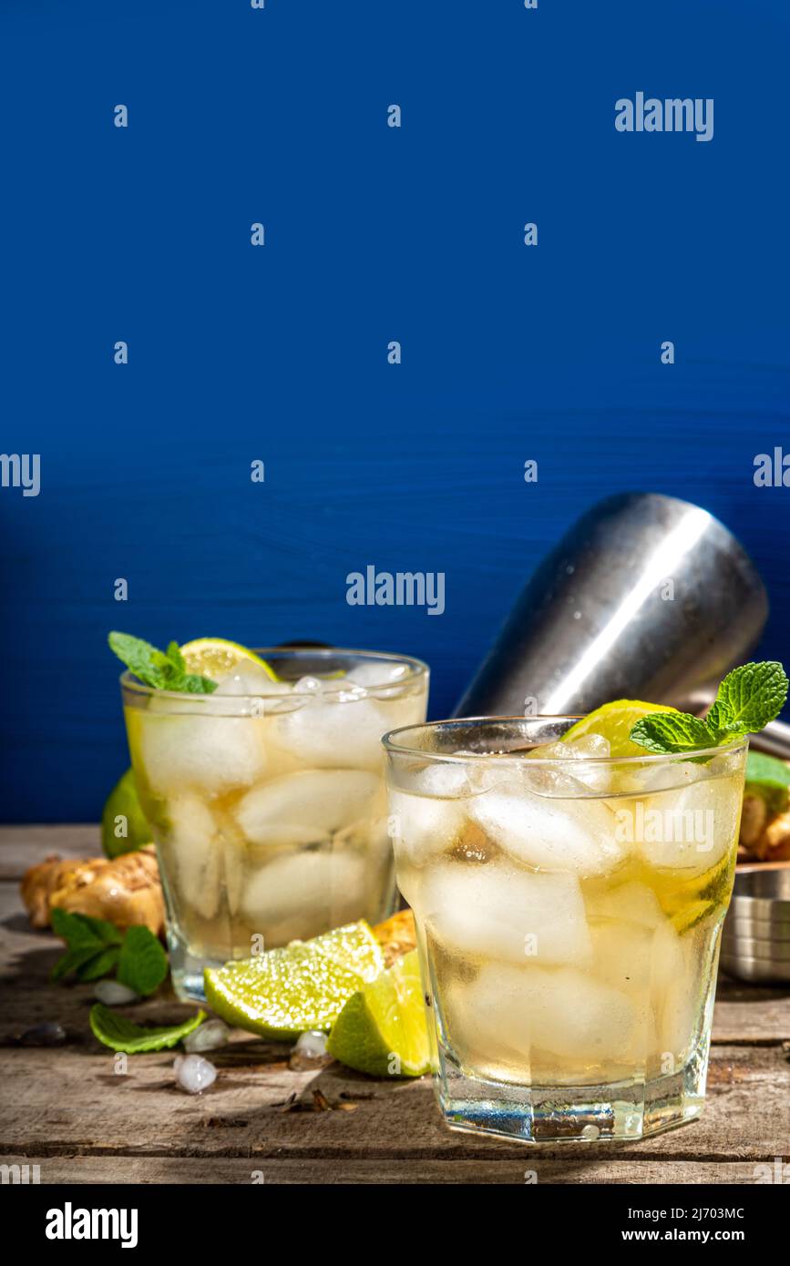 Ginger lemon cold alcohol cocktail Ginger ale beer strong drink with ...