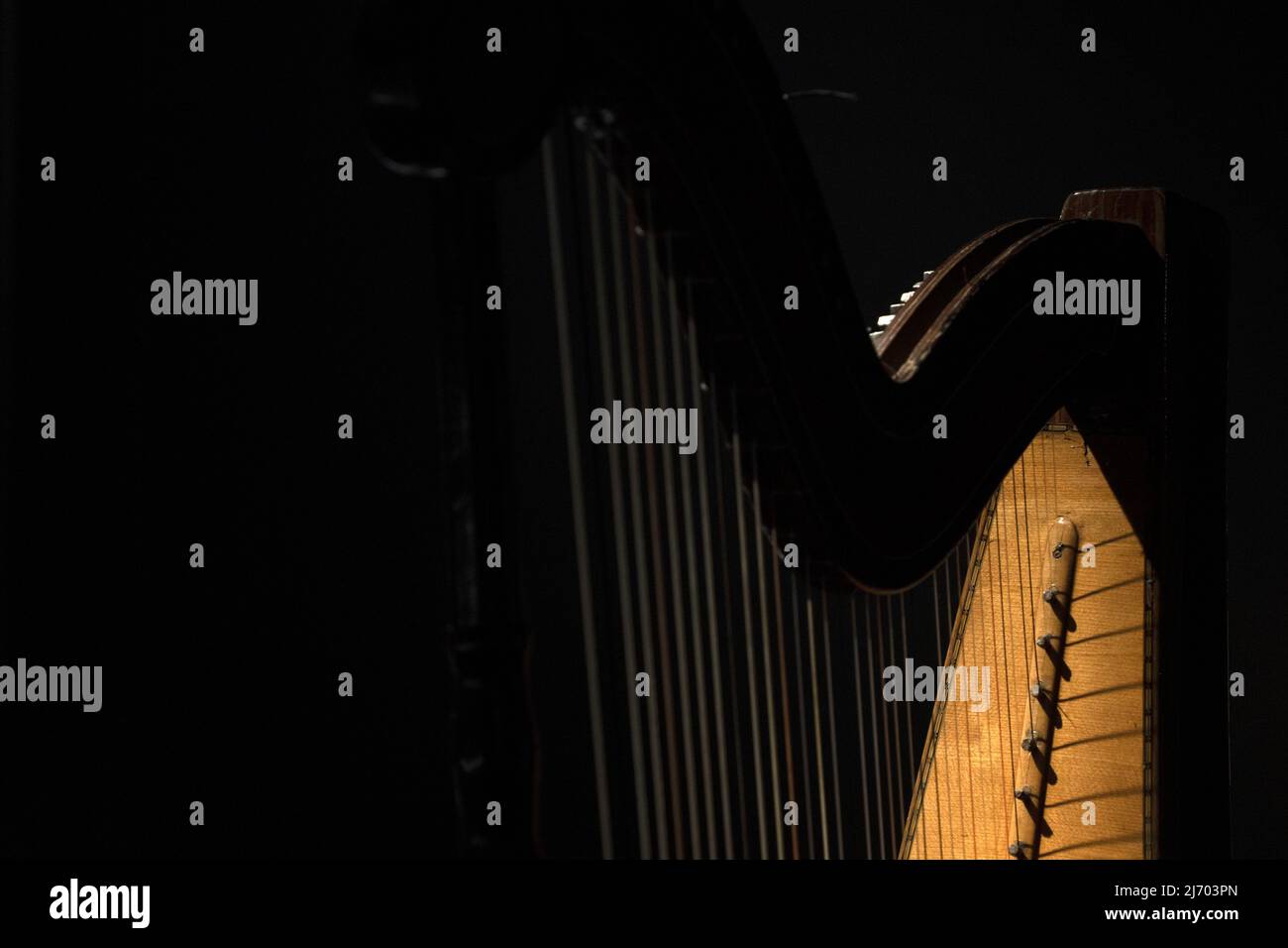 harp strings detail close up isolated on black background Stock Photo ...