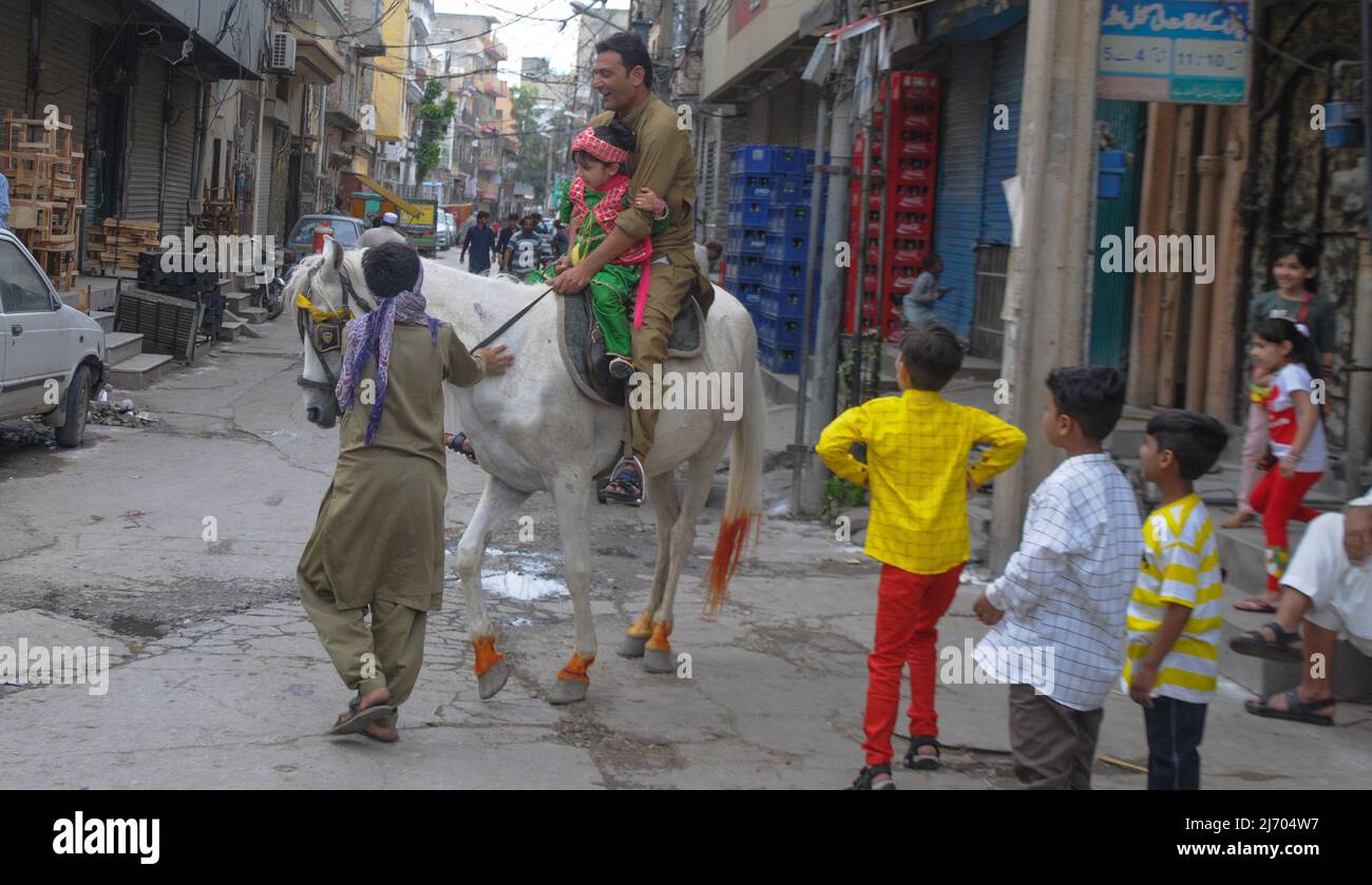 May 4, 2022, Rawalpindi, Punjab, Pakistan: Pakistani kids enjoy their ...