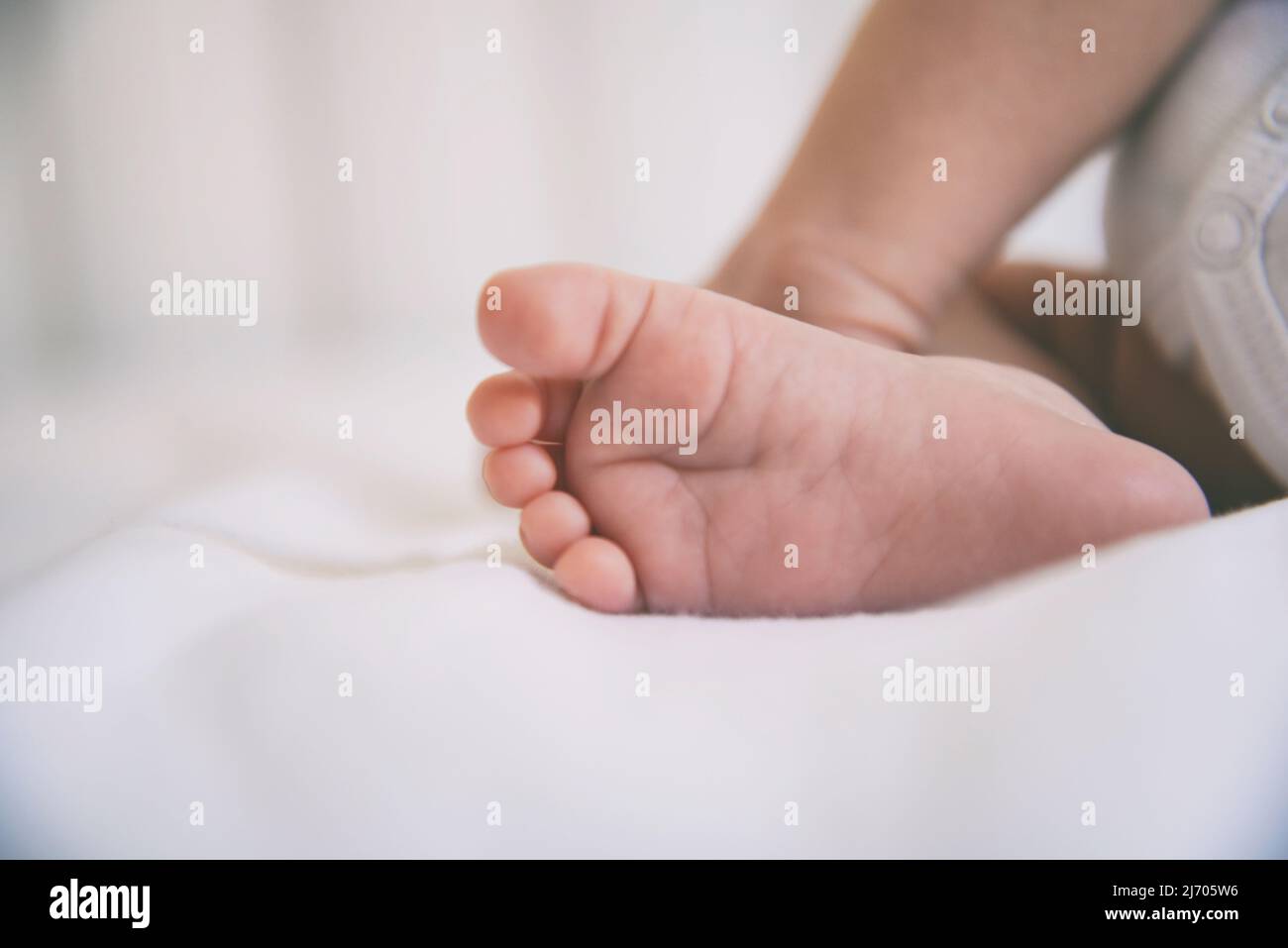 Baby foot close-up Stock Photo - Alamy