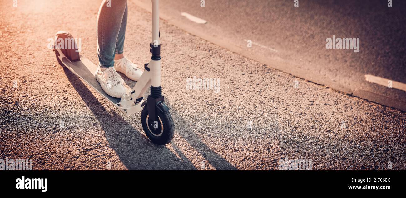 Scooter rider on path hi-res stock photography and images - Alamy