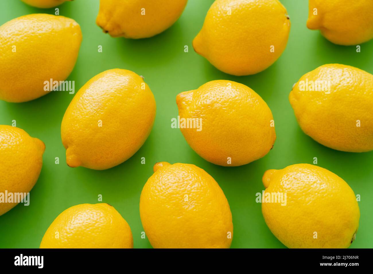 Fresh lemons on green hi-res stock photography and images - Alamy