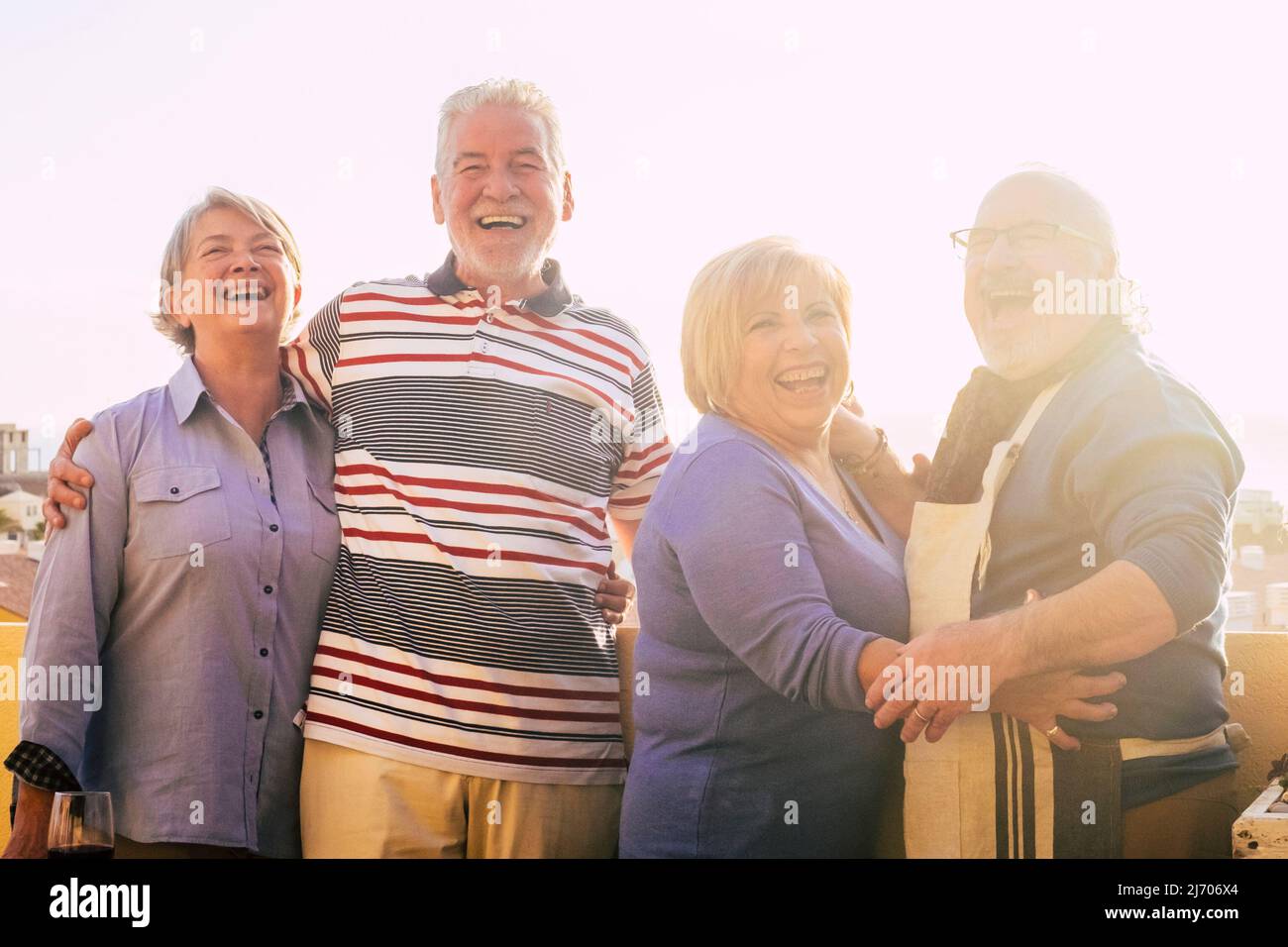 Portrait of happy and cheerful mature senior people enjoying friendship ...