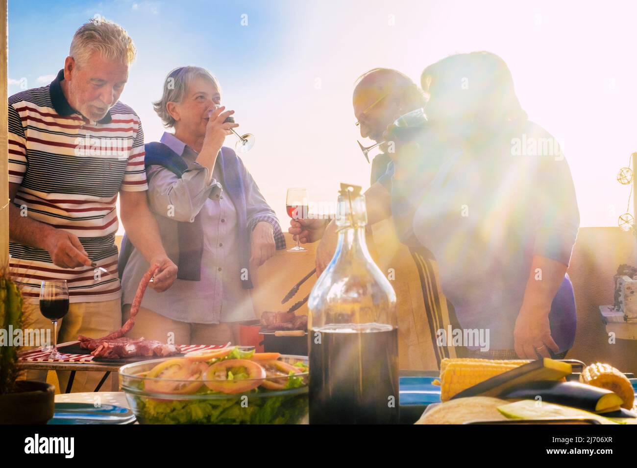 Outdoor barbeque old age people hi-res stock photography and images - Alamy