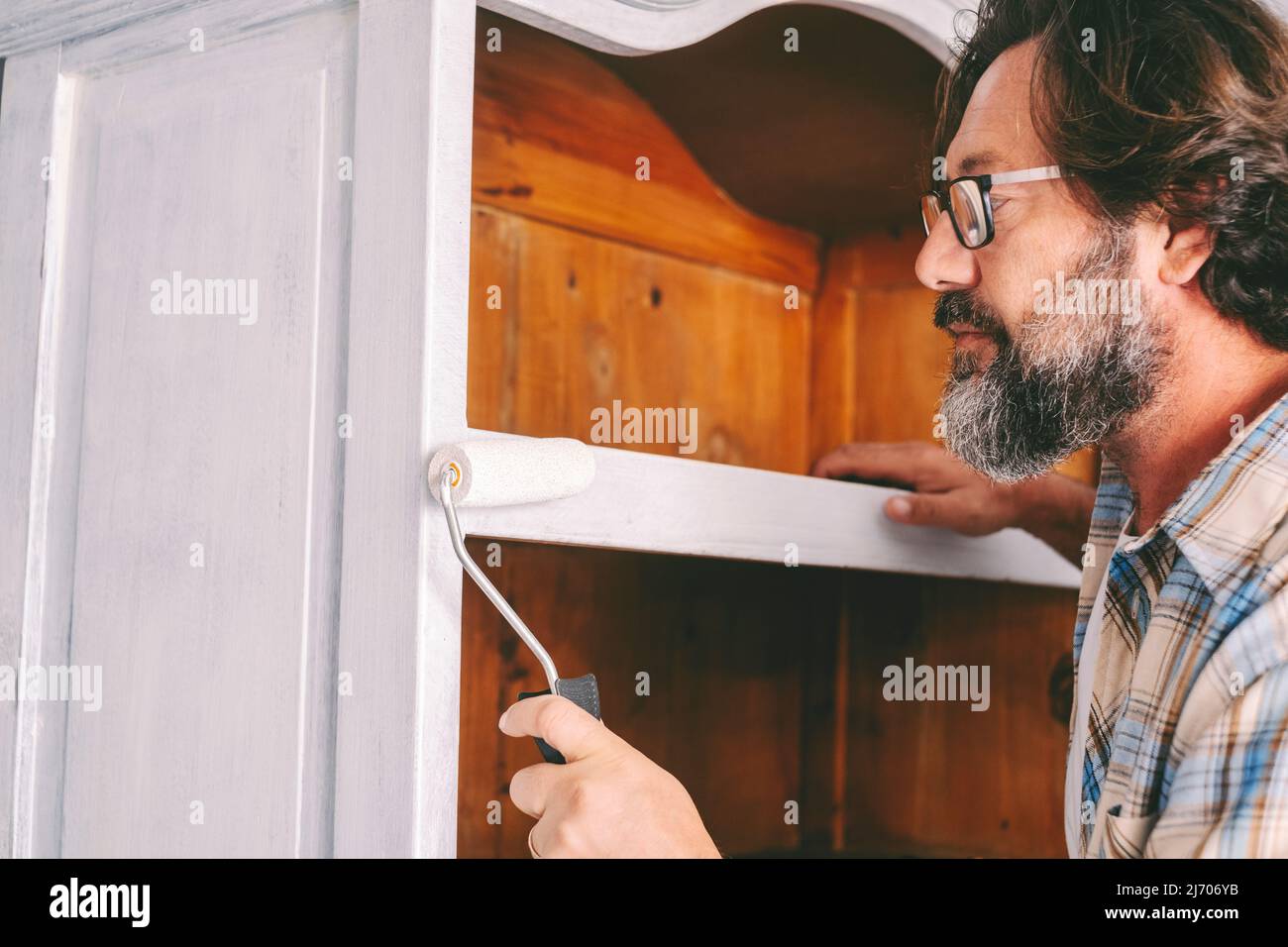 Hobby diy indoor house leisure activity people lifestyle. Mature man ...