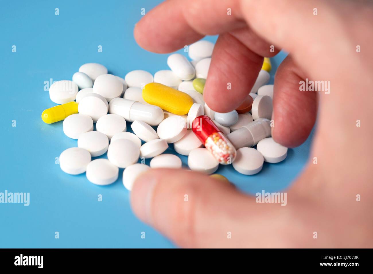 Person taking pills, drugs or pills addiction, concept picture Stock ...