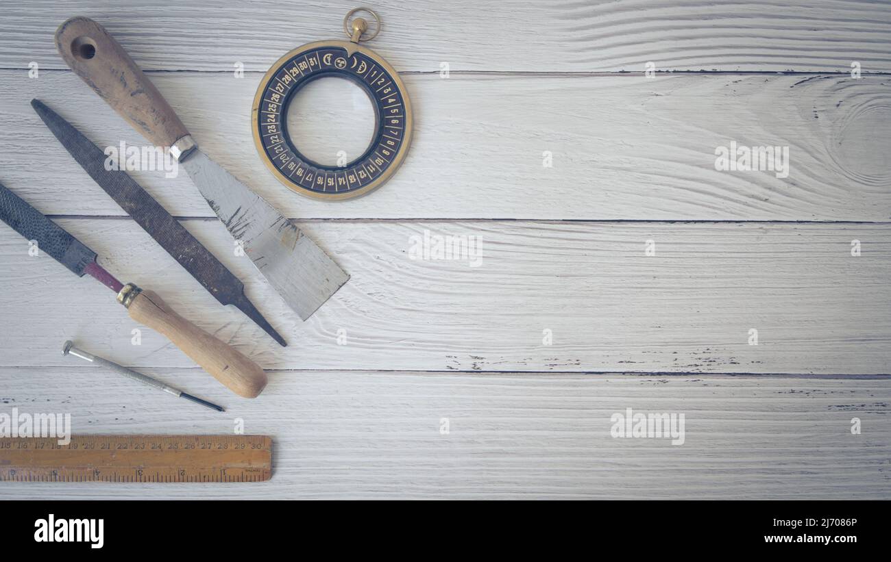 Handyman's tools on wood background Stock Photo - Alamy