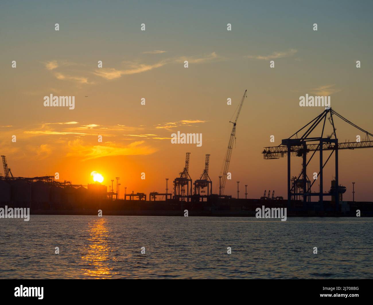 black sea port Odesa, Ukraine with a lot of cranes, cabins, boxes and ...