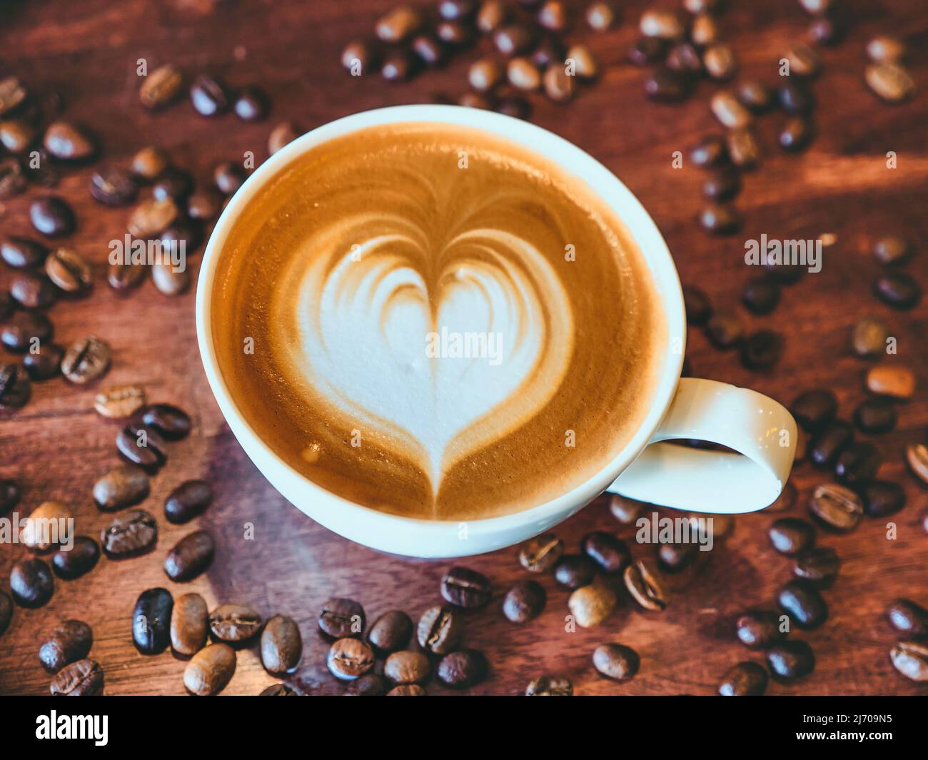 coffee latte art on wood table flat lay , relax time, cafe barista art ...