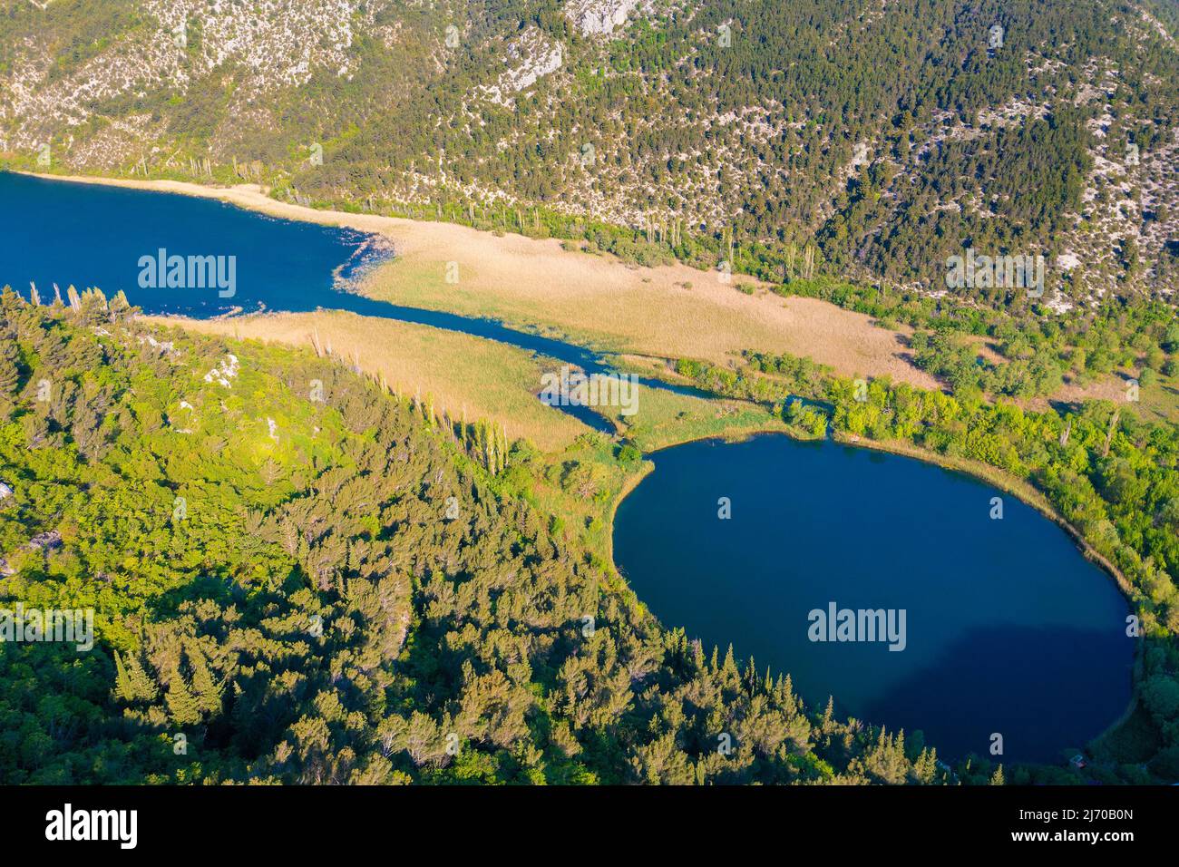 Aerial view of Torak lake spring in the Cikola River canyon, Croatia ...