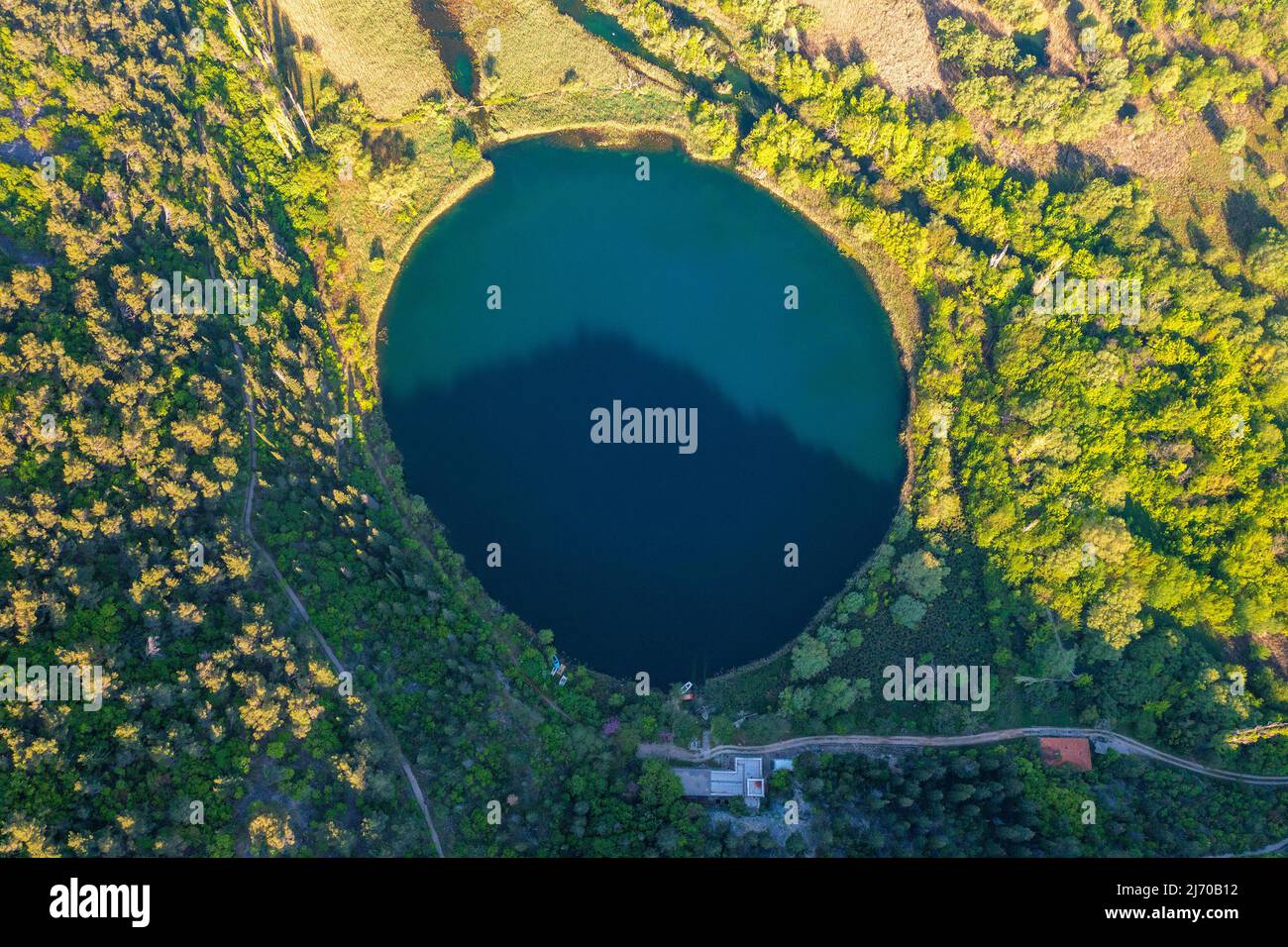 Aerial view of Torak lake spring in the Cikola River canyon, Croatia ...