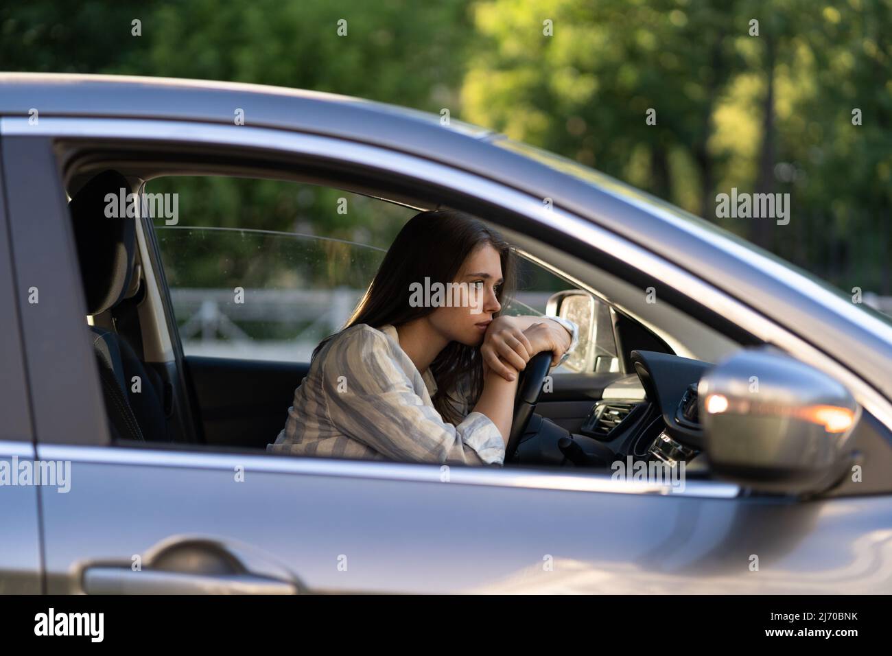Girl driver feeling doubtful confused about difficult decision ...