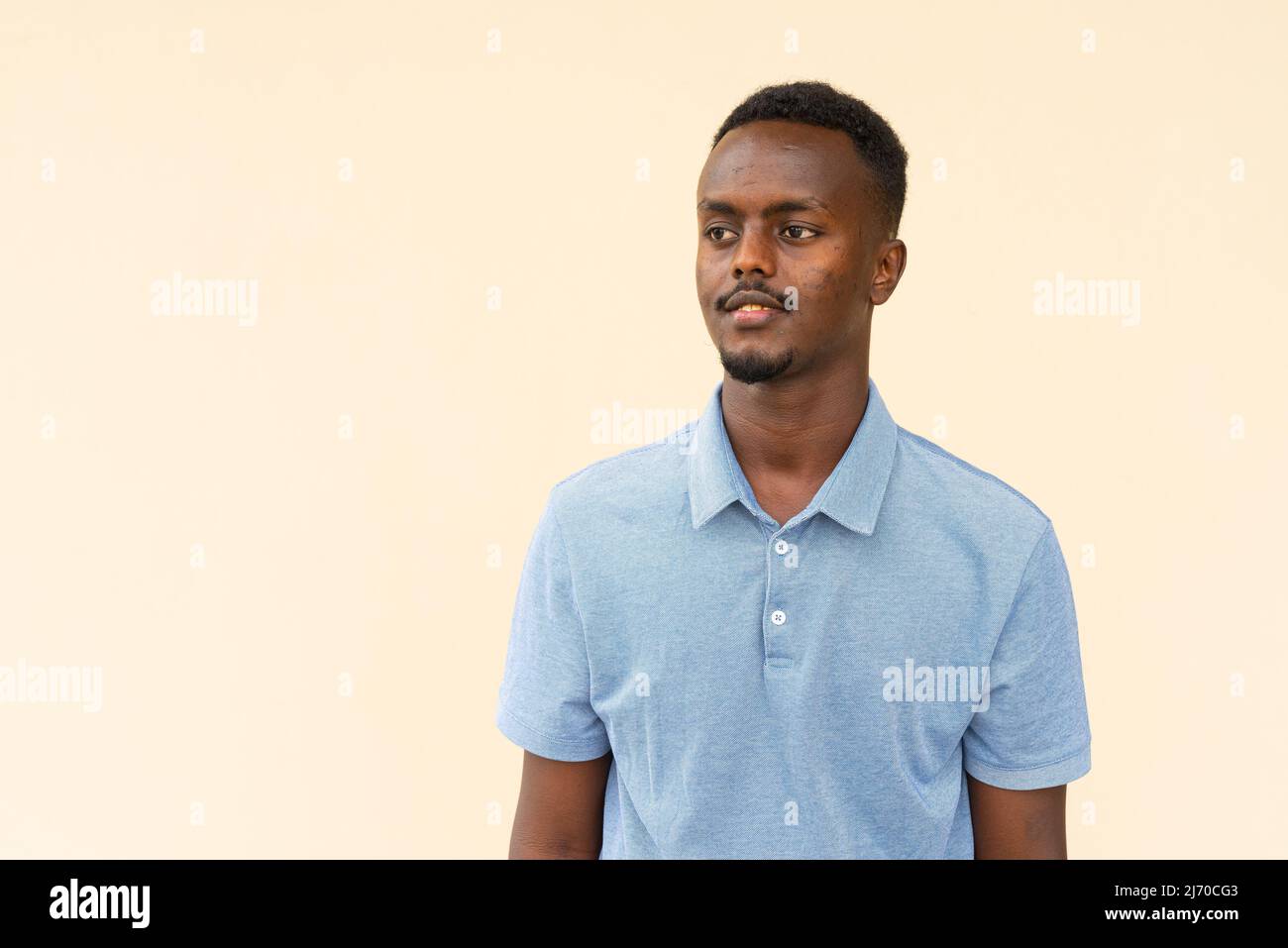 Portrait of young successful black businessman Stock Photo - Alamy