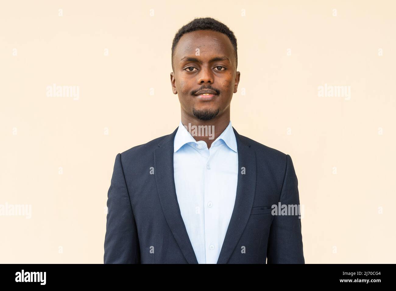 Portrait of young successful black businessman Stock Photo - Alamy