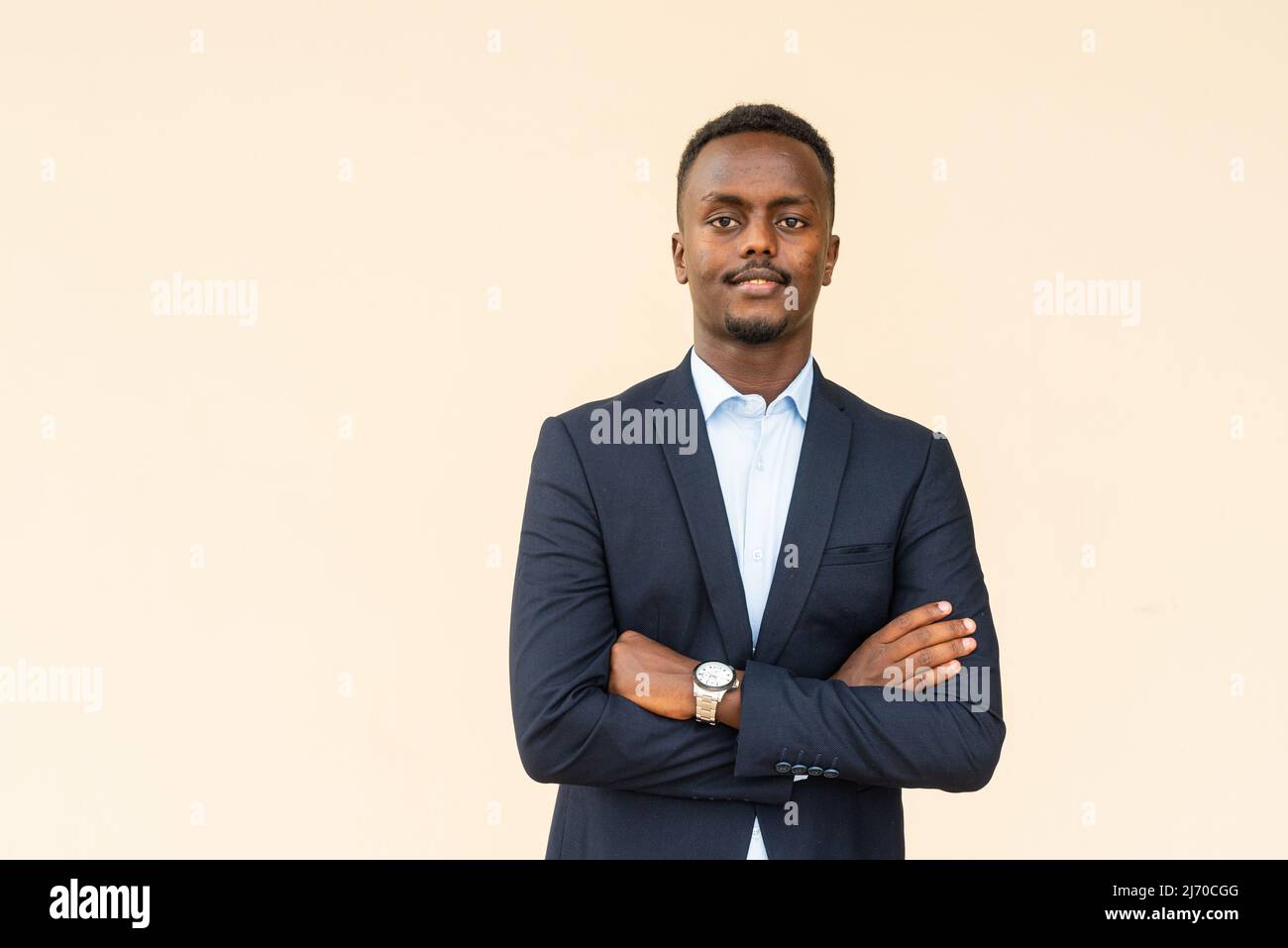 Portrait of young successful black businessman Stock Photo - Alamy