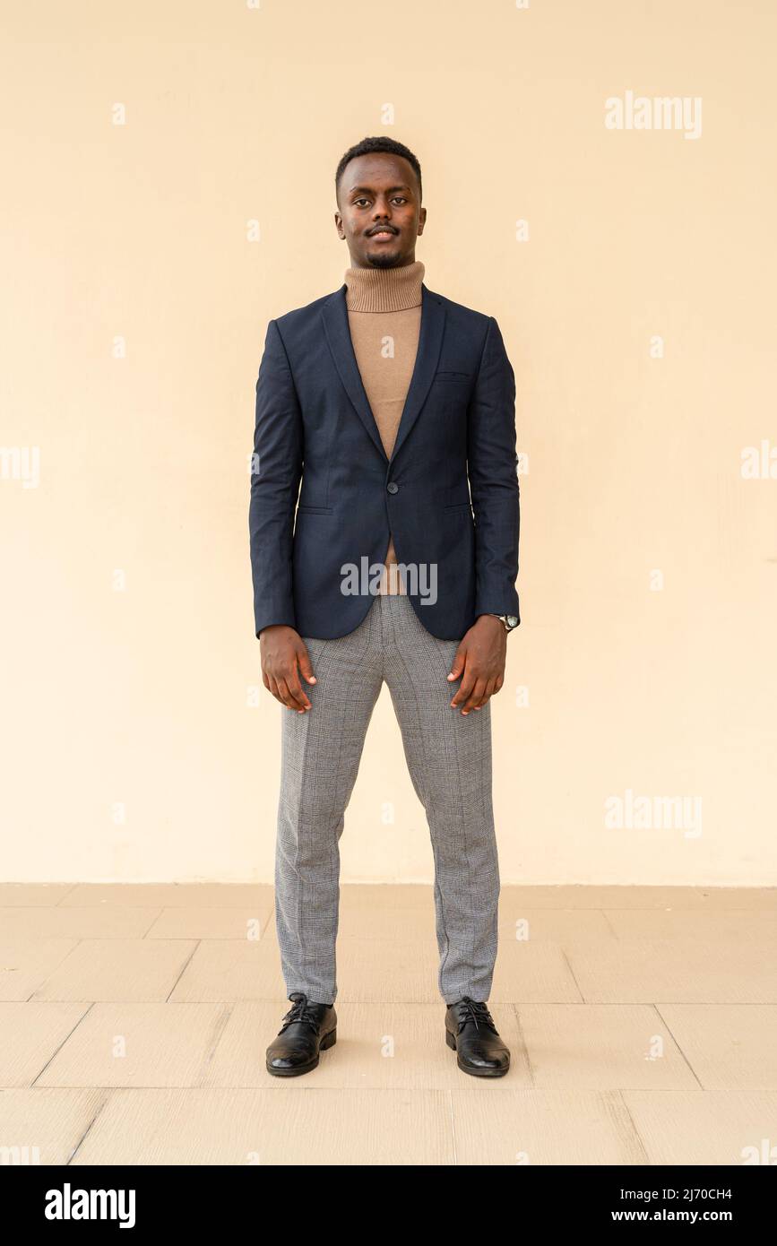 Full length portrait of young successful black businessman Stock Photo ...