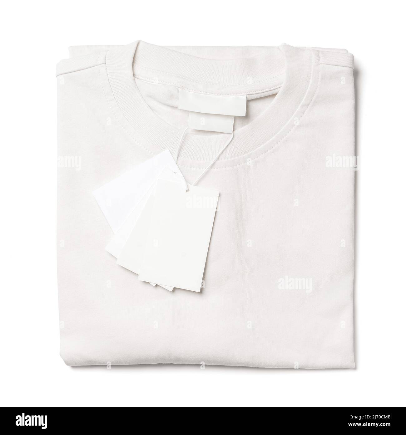 T-shirt with blank paper labels on white background Stock Photo - Alamy