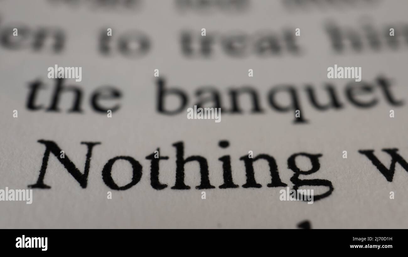 Nothing text in open book page, selective focus, close up, macro shot ...