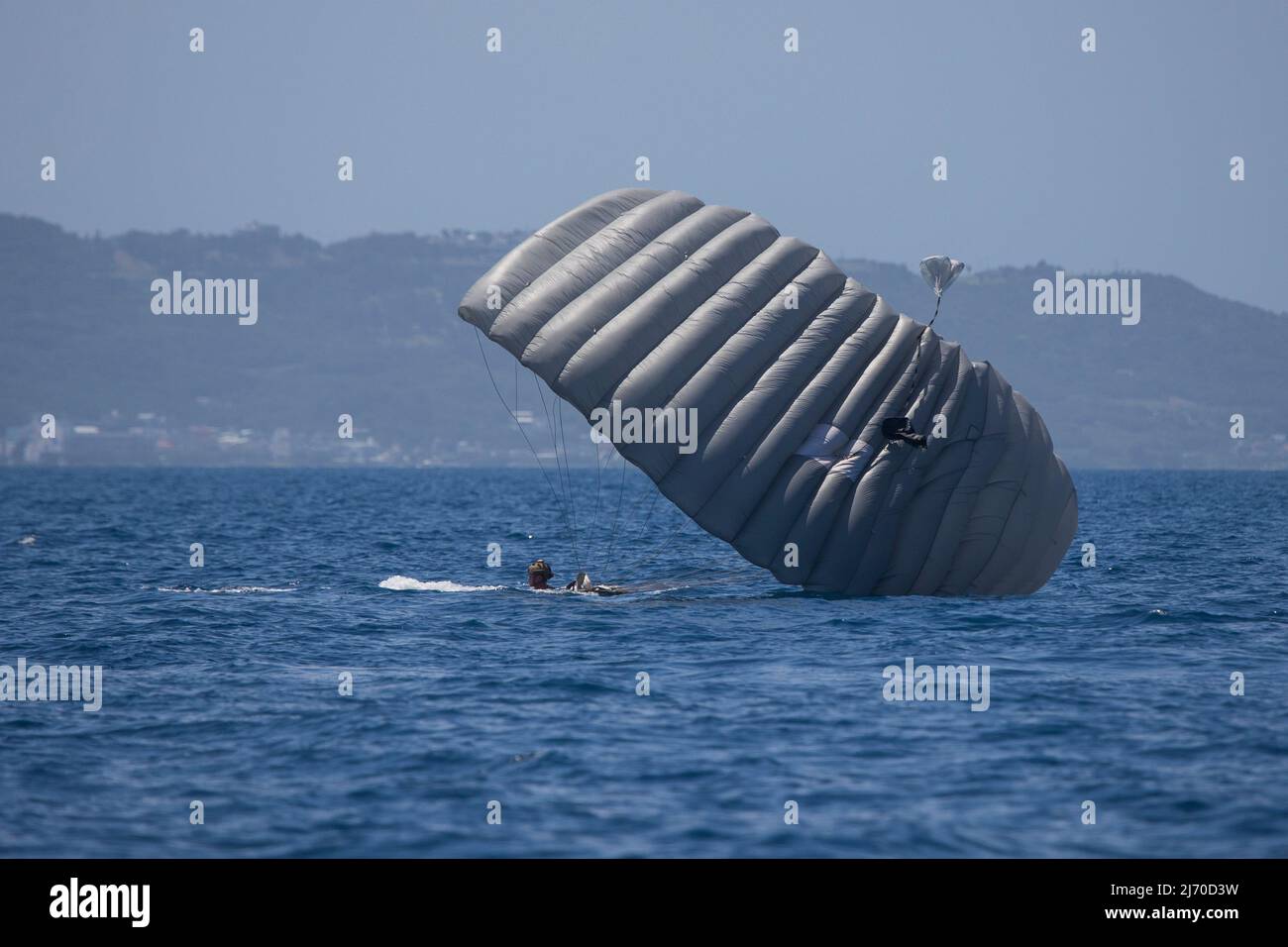 A U.S. Marine with 3d Reconnaissance Battalion, 3d Marine Division ...