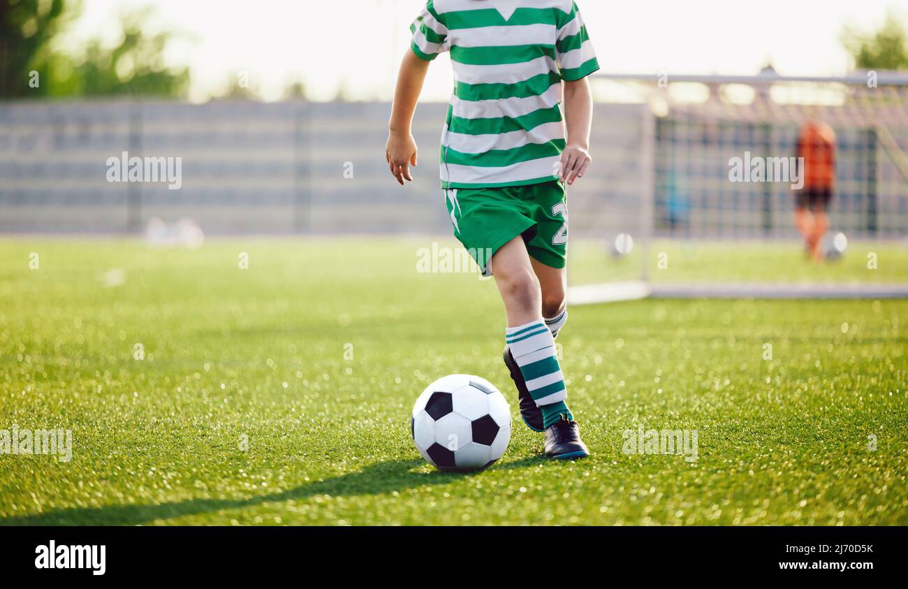 Football Player Running Ball Background. Low Angle Image of Soccer Boy ...