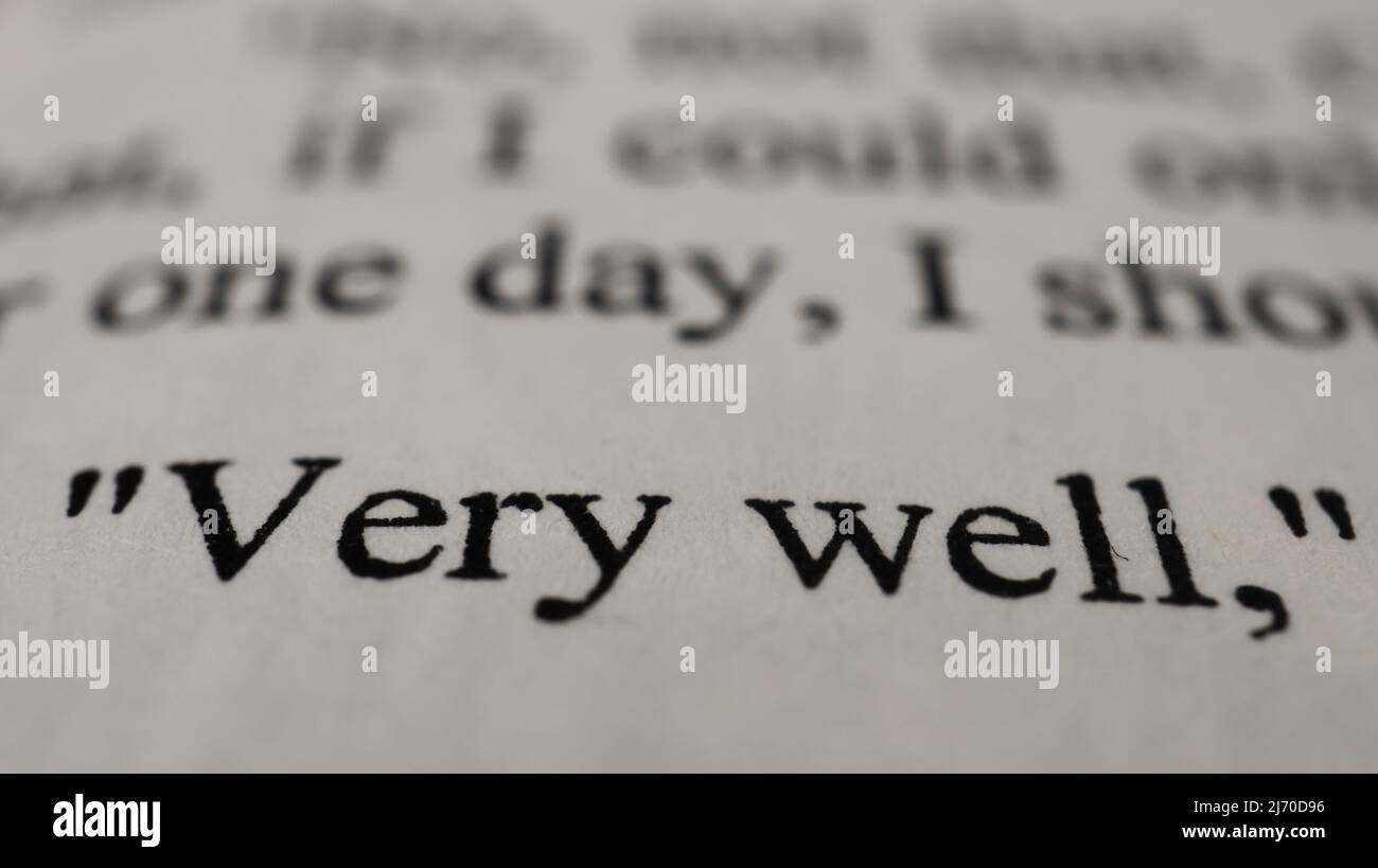 Very well text in open book page, selective focus, close up, macro shot ...