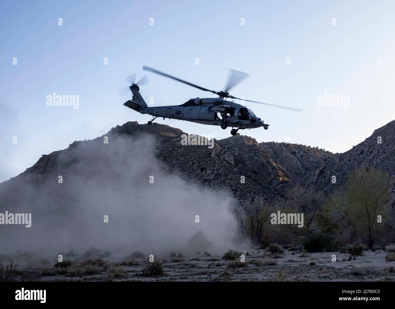 An Mh-60S Knighthawk helicopter attached to Helicopter Sea Combat ...