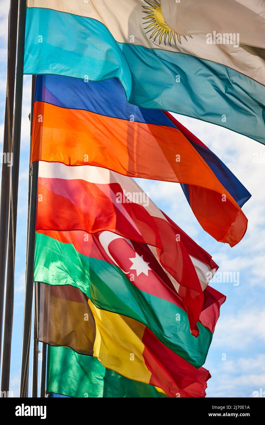 Flags of the word waving in the wind. Nation emblems Stock Photo - Alamy
