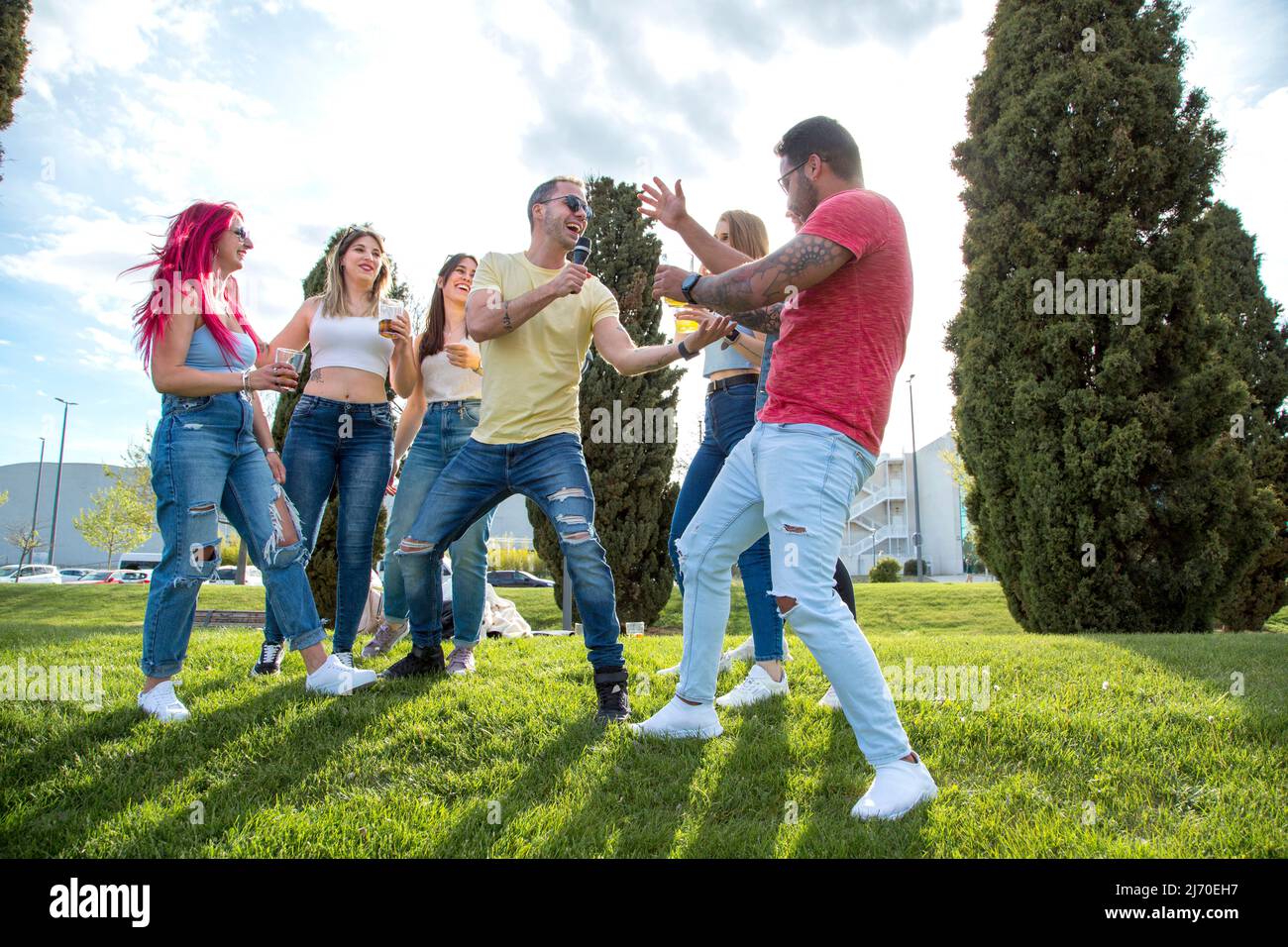 Women group singing hi-res stock photography and images - Alamy
