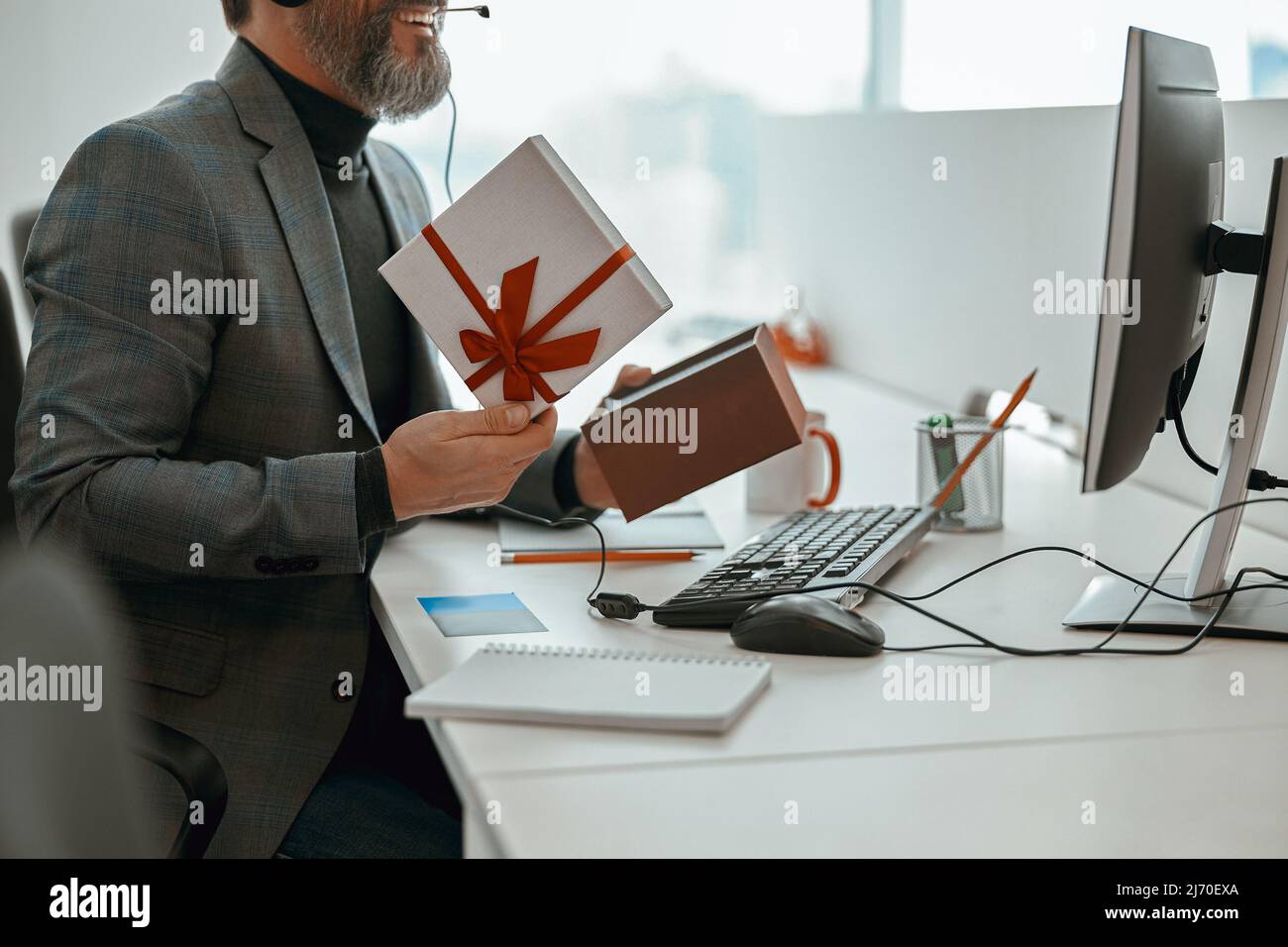 Businessman opening a box hi-res stock photography and images - Alamy