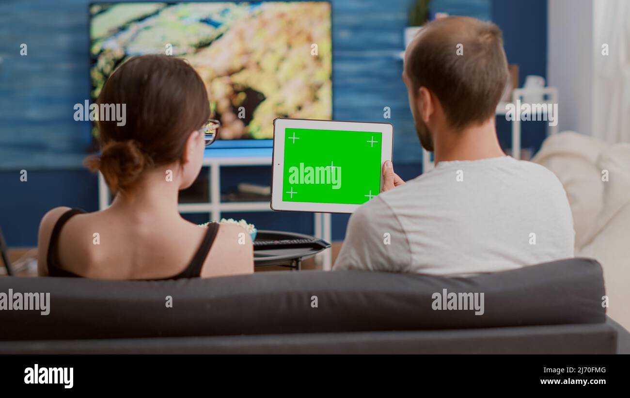 Static tripod shot of man and woman couple watching influencer vlog ...