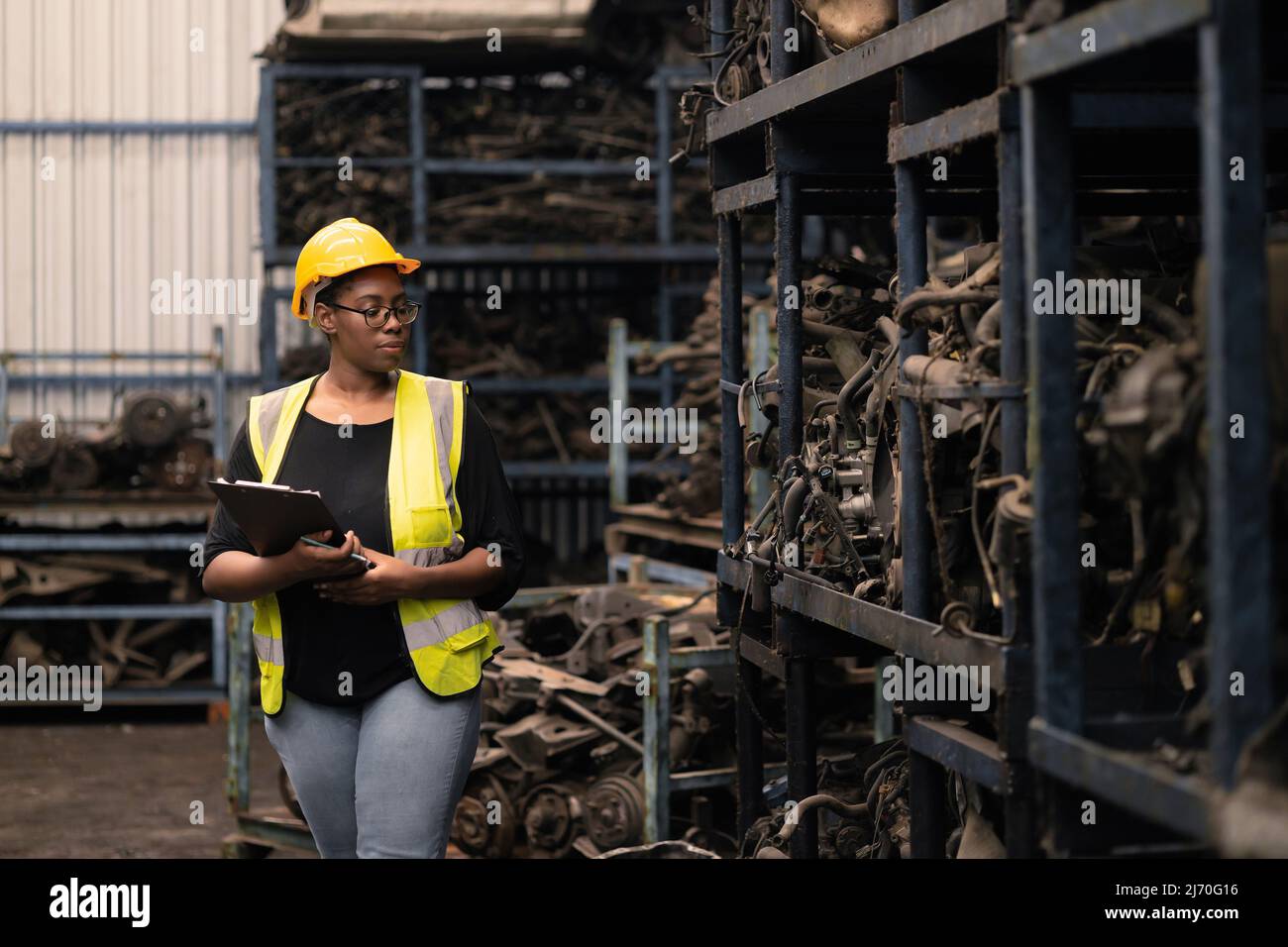 black african women worker working inspect check stock inventory of ...