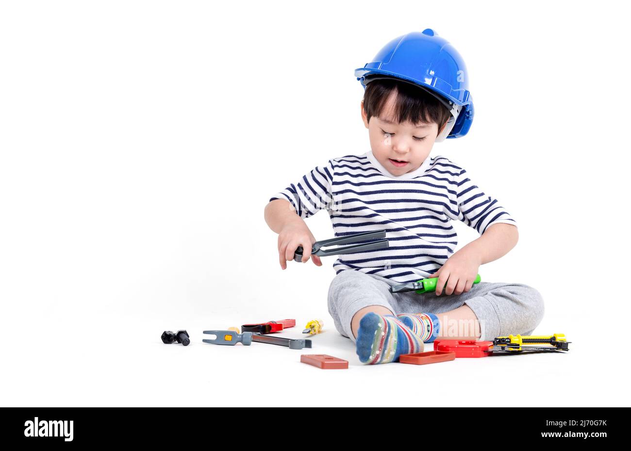 ittle boy playing act engineer, education concept Stock Photo - Alamy