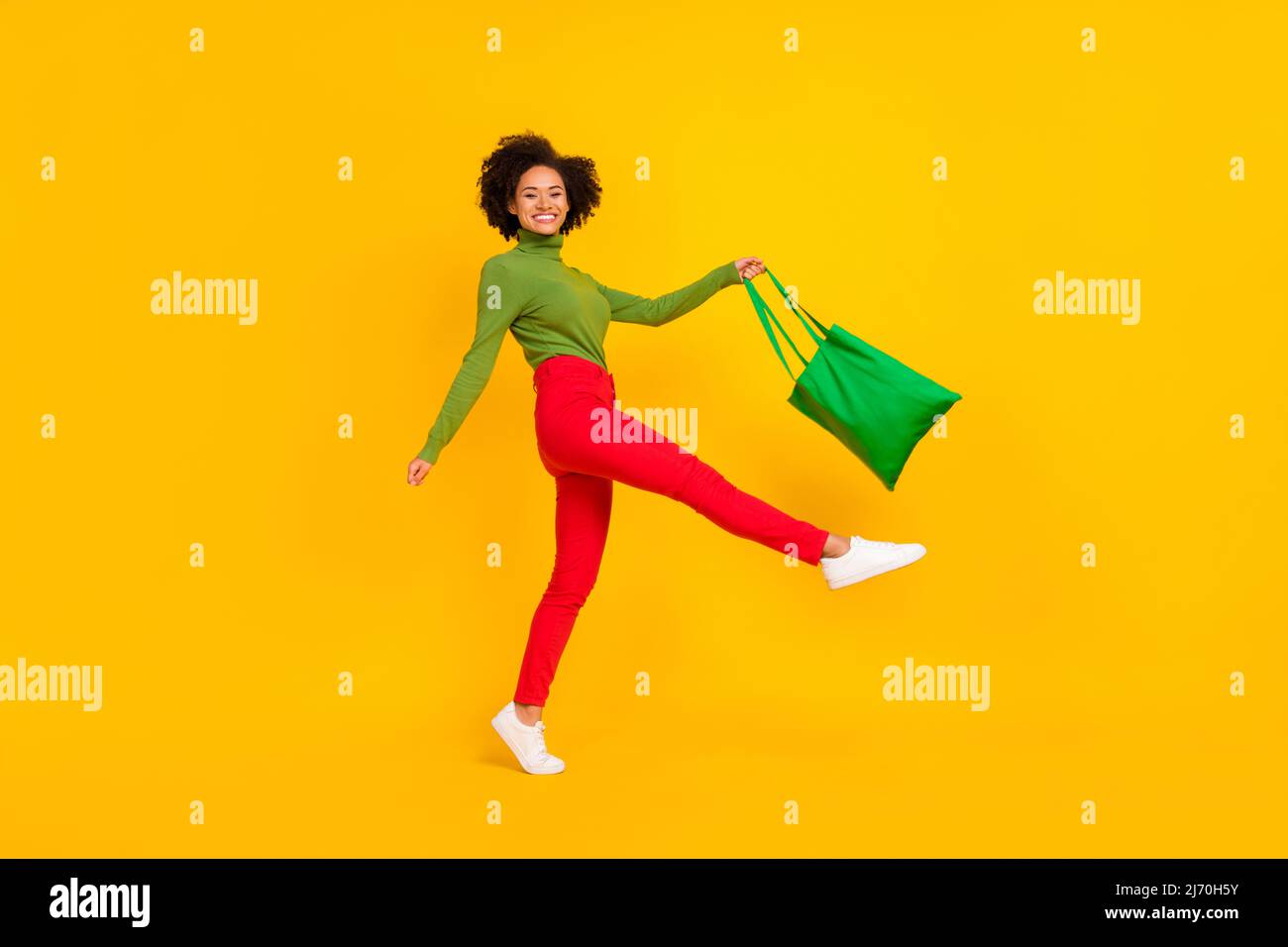 Full size profile side photo of young excited lady have fun walk ...
