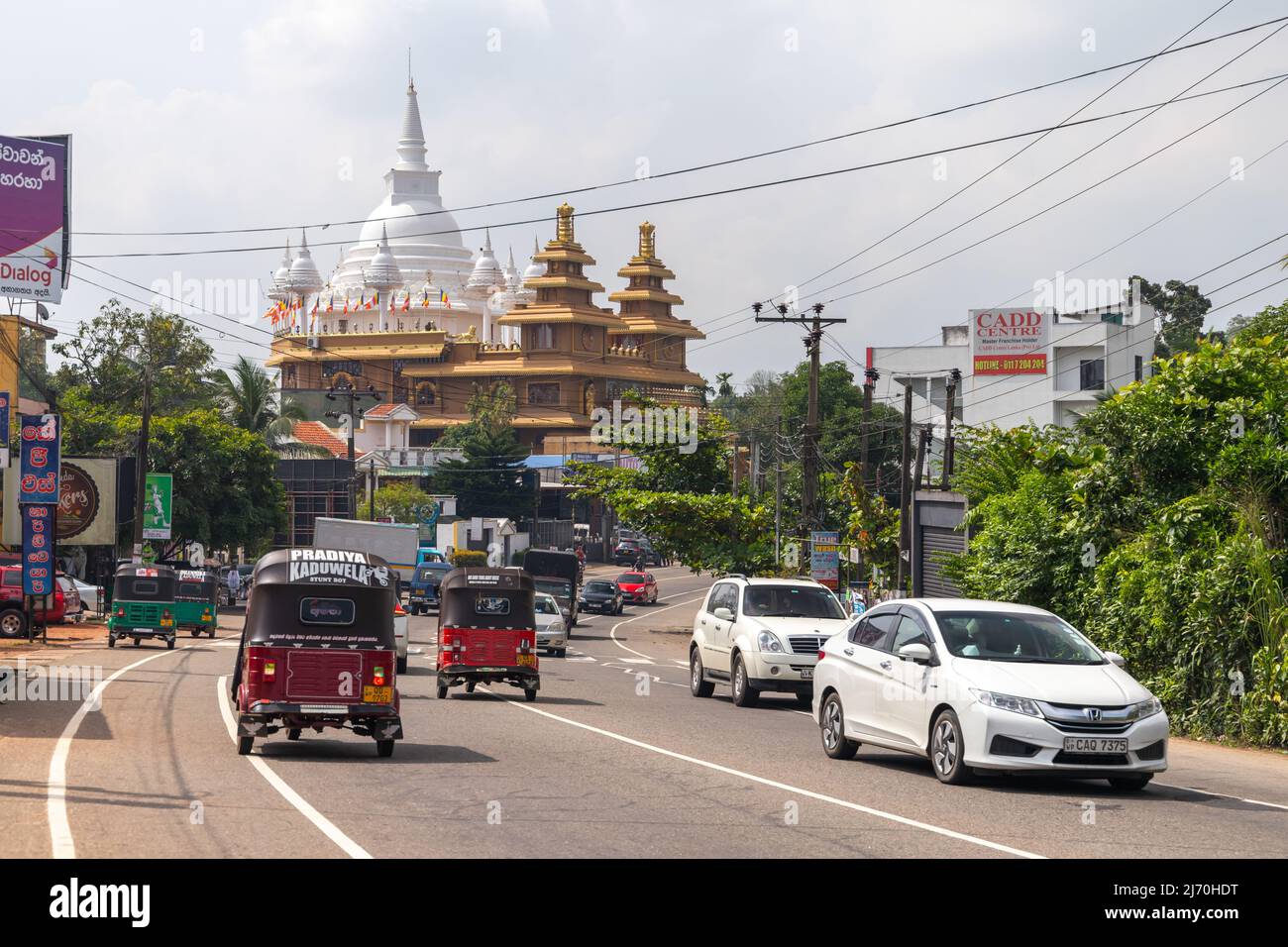 Malabe, Sri Lanka - December 4, 2021: Street view with cars, tuk tuks ...