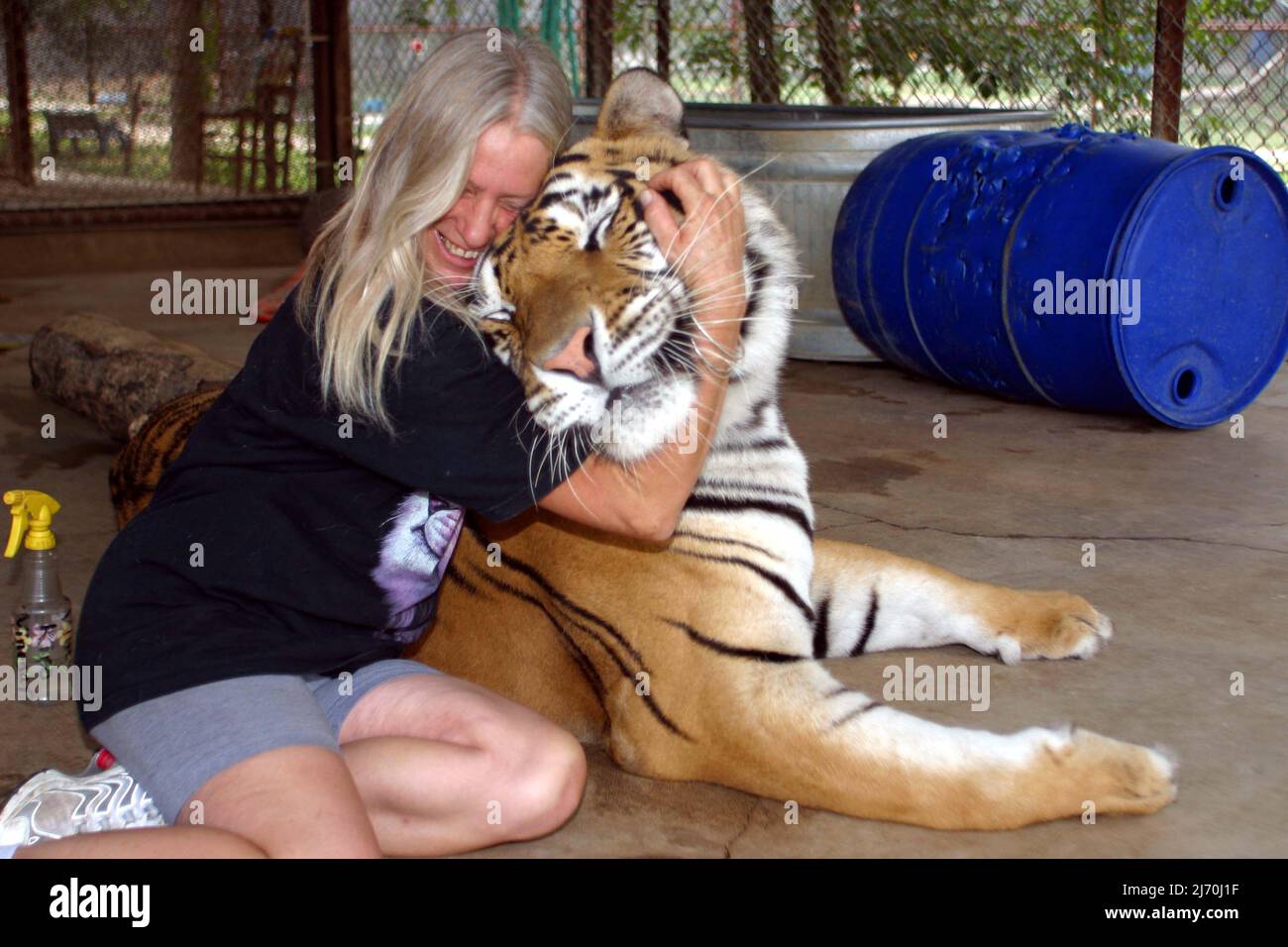 VICKY KEAHEY WITH TACOMA RESCUED AS CUB. VICKY ALONG WITH VOLUNTEERS ...