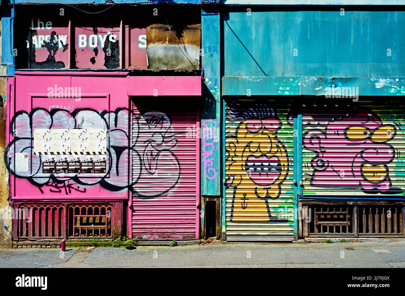 Graffiti on closed shop front, Manchester, England Stock Photo - Alamy