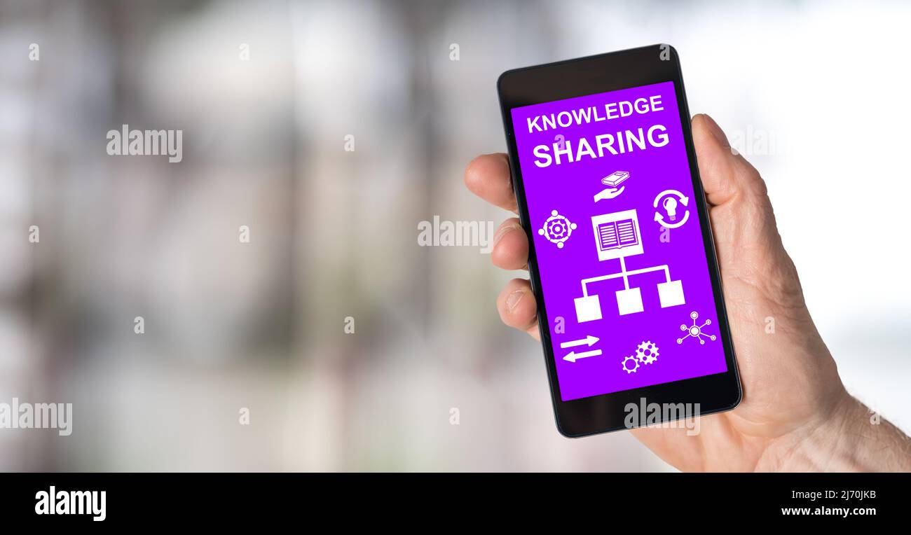 Smartphone screen displaying a knowledge sharing concept Stock Photo ...