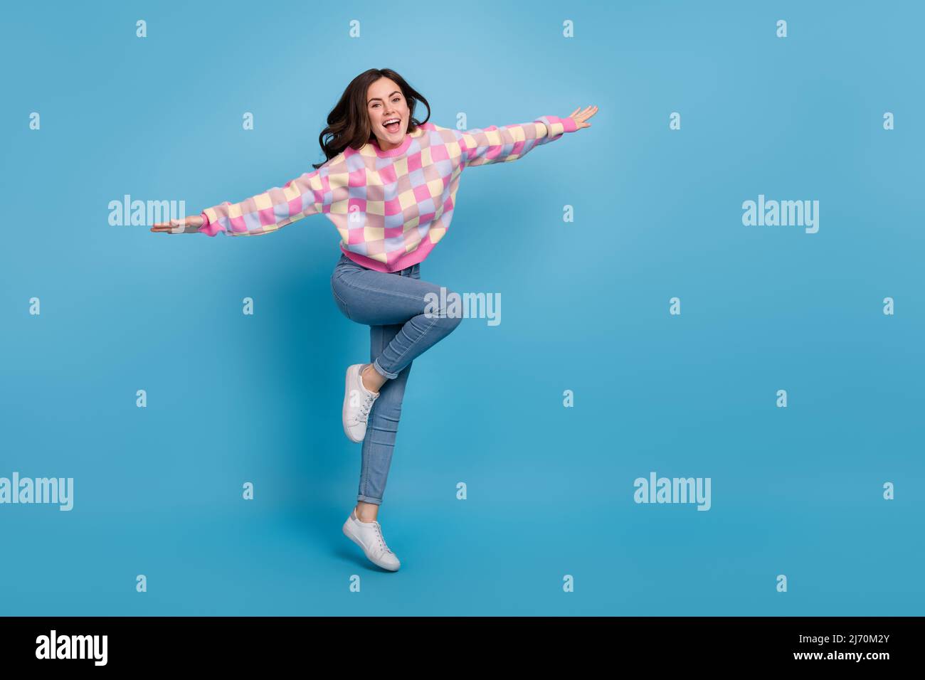 Full size photo of young excited girl have fun jumper dream travel ...