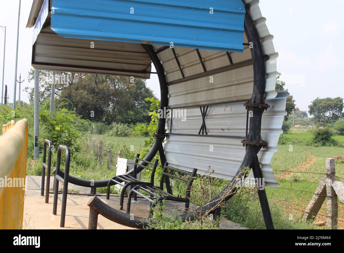Small order iron shelter blue colour sitting pleass Stock Photo - Alamy