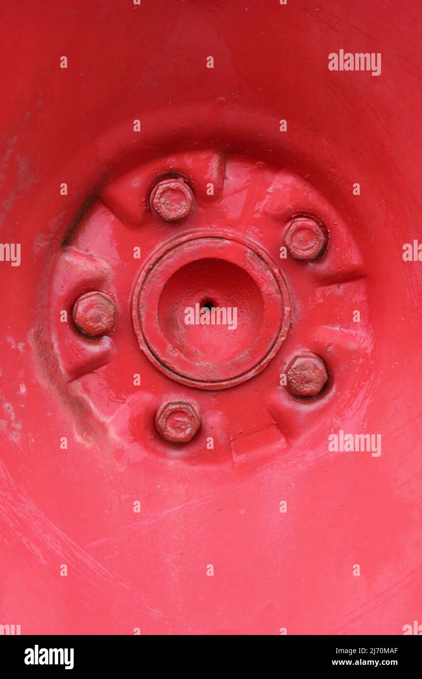 Traditional vintage bright red tractor mechanical engine and frame ...