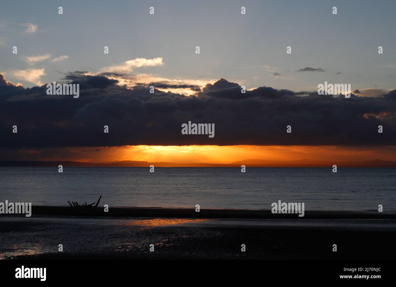 ShipWreck during sunset on the beach near Edinburgh, Scotland, UK Stock ...
