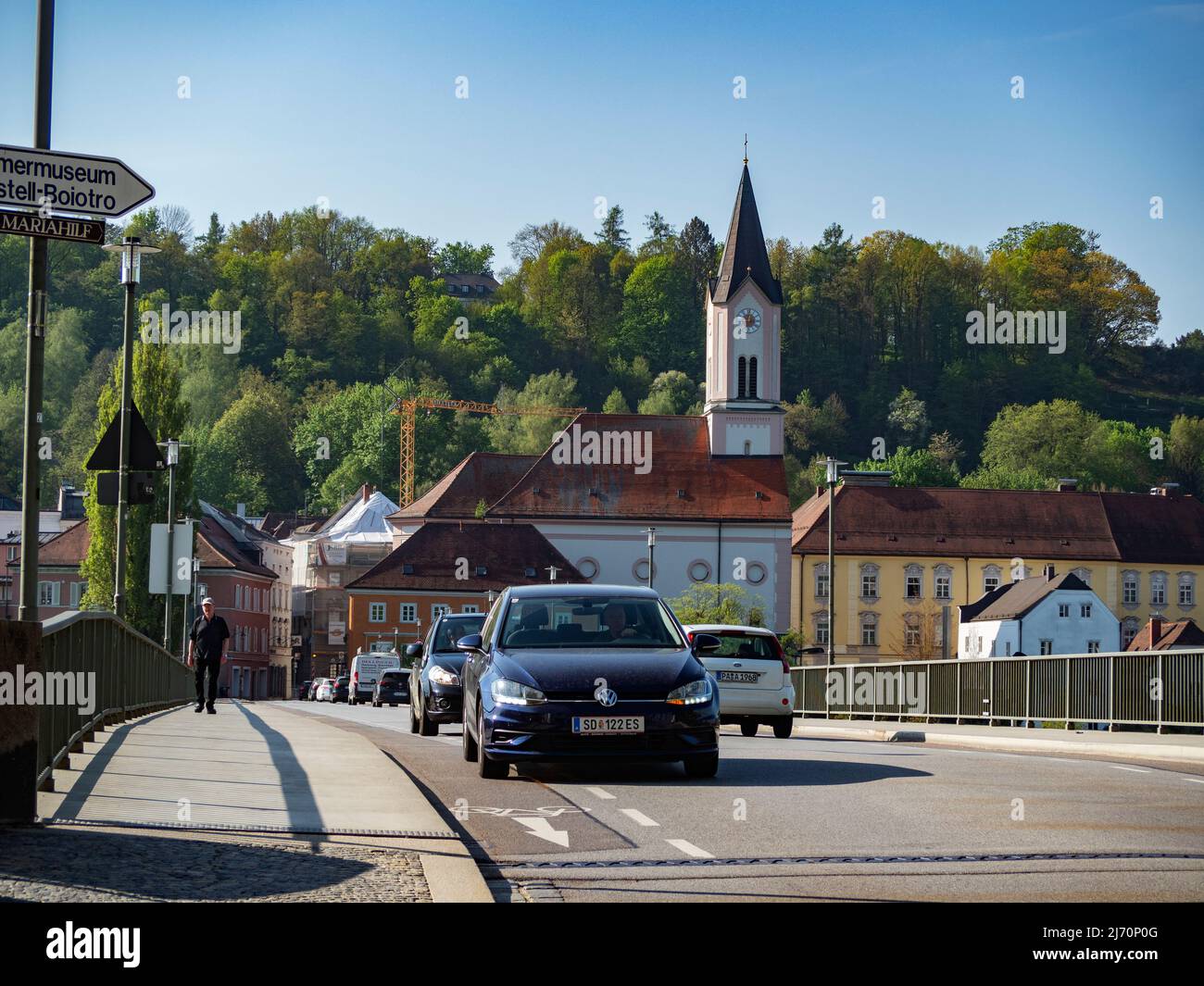 Cars drive over the bridge over the Inn River Stock Photo - Alamy